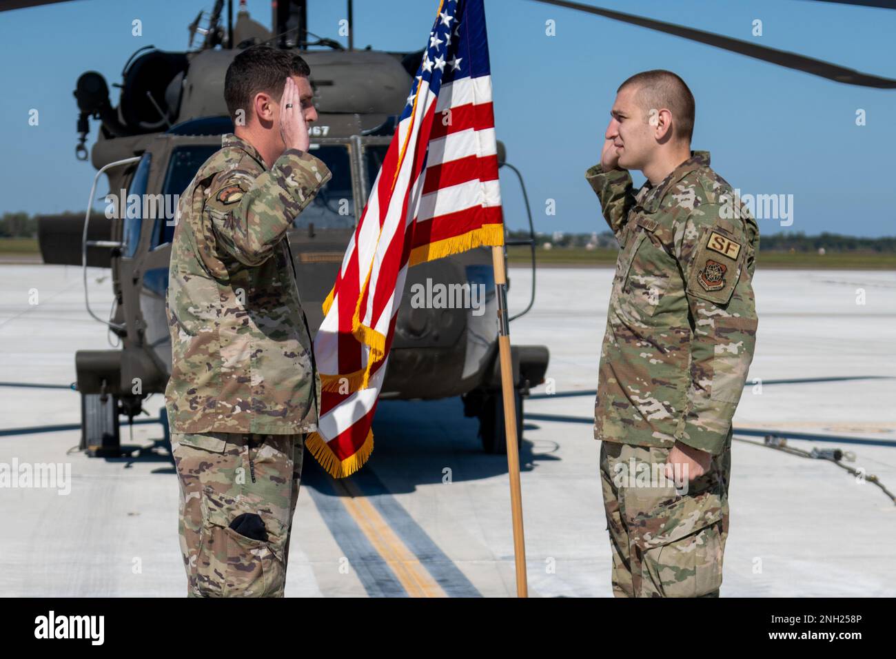 U.S. Air Force Lt. Col. Brain Rutt, 6th Security Forces commander, left ...
