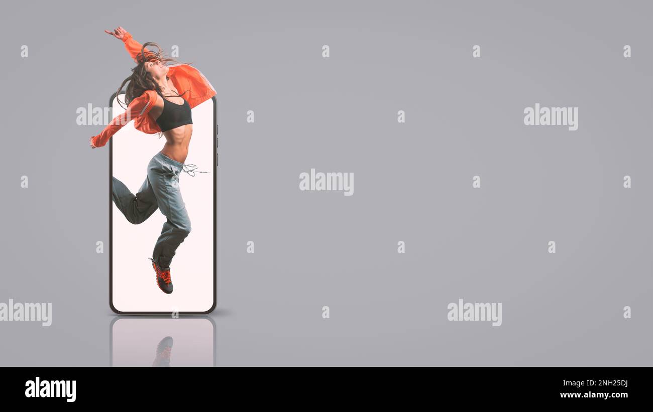 Professional dancer jumping out of a smartphone screen, mobile apps and ...