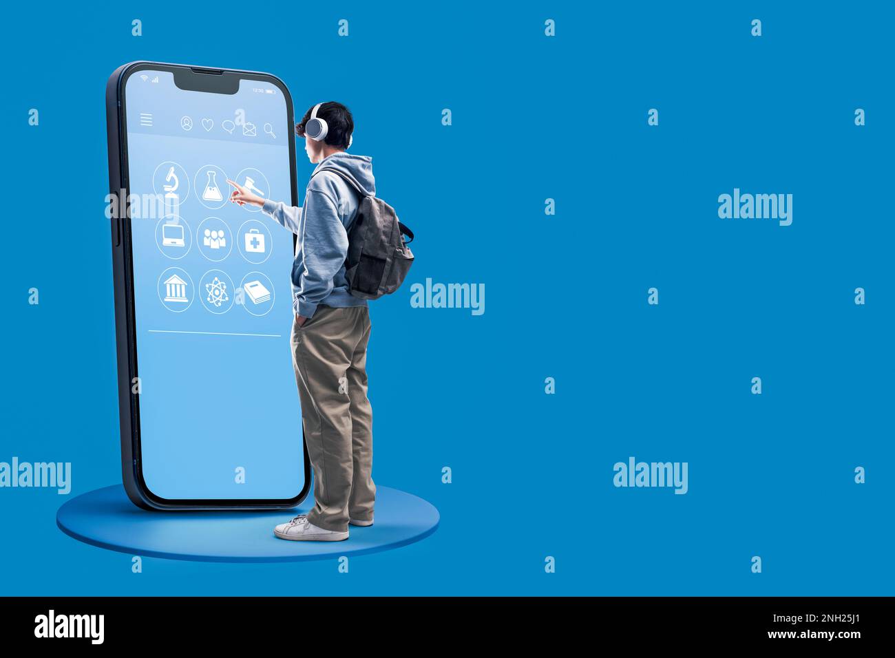 Smart student using a big smartphone with online education app ...