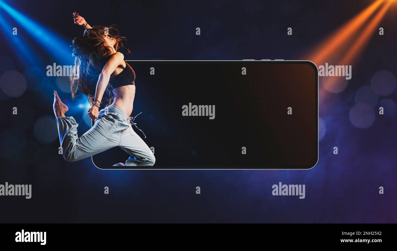 Professional dancer jumping out of a smartphone screen and stage lights ...