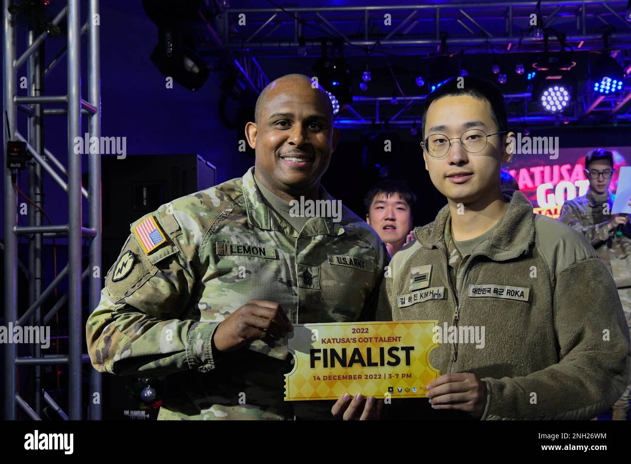 Pfc. Ha Jin Kim receives a finalist ticket from U.S. Army Command Sgt ...