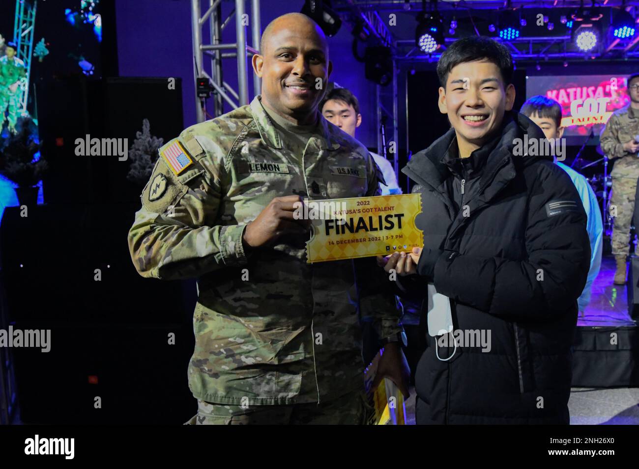 Sgt. Yo Han Shin receives a finalist ticket from U.S. Army Command Sgt ...