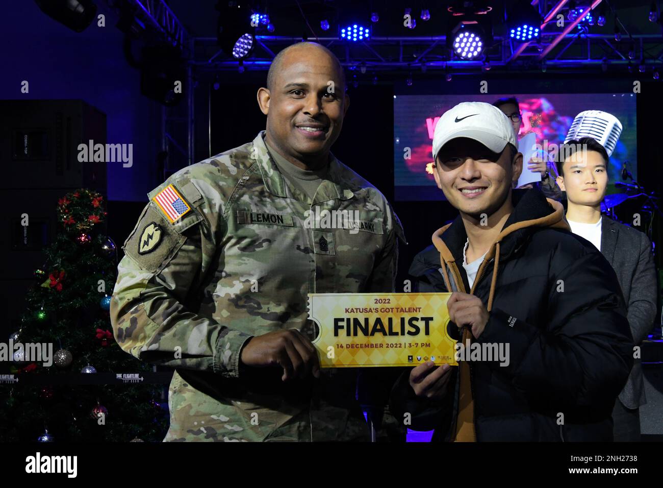 Pfc. Mu Jin Kim receives a finalist ticket from U.S. Army Command Sgt ...