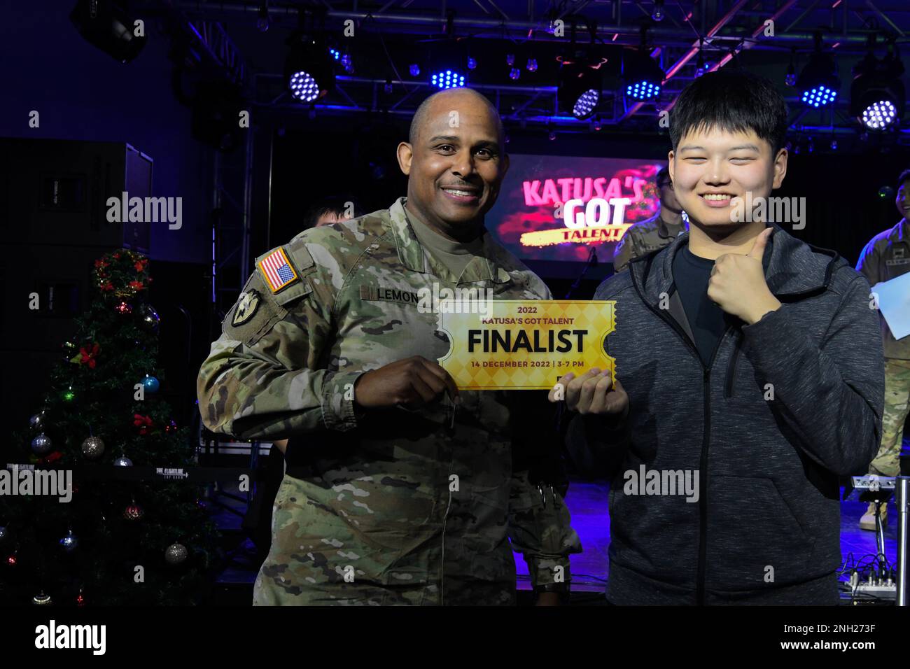 Pfc. In Sung Yang receives a finalist ticket from U.S. Army Command Sgt ...