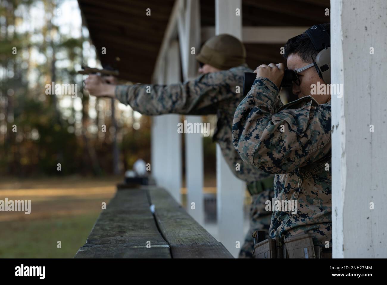 U.S. Marine Corps Sgt. Ashly Cordova, right, shot spots for Sgt. Weston Rushing, both combat ...