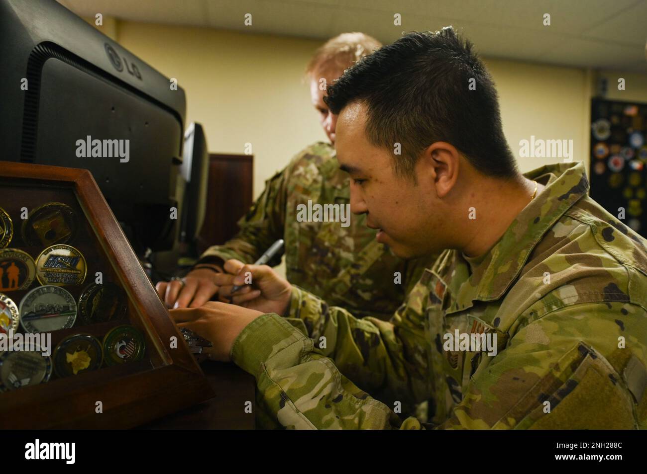 U.S. Air Force Tech. Sgt. Leon Yang, a resource advisor assigned to the ...