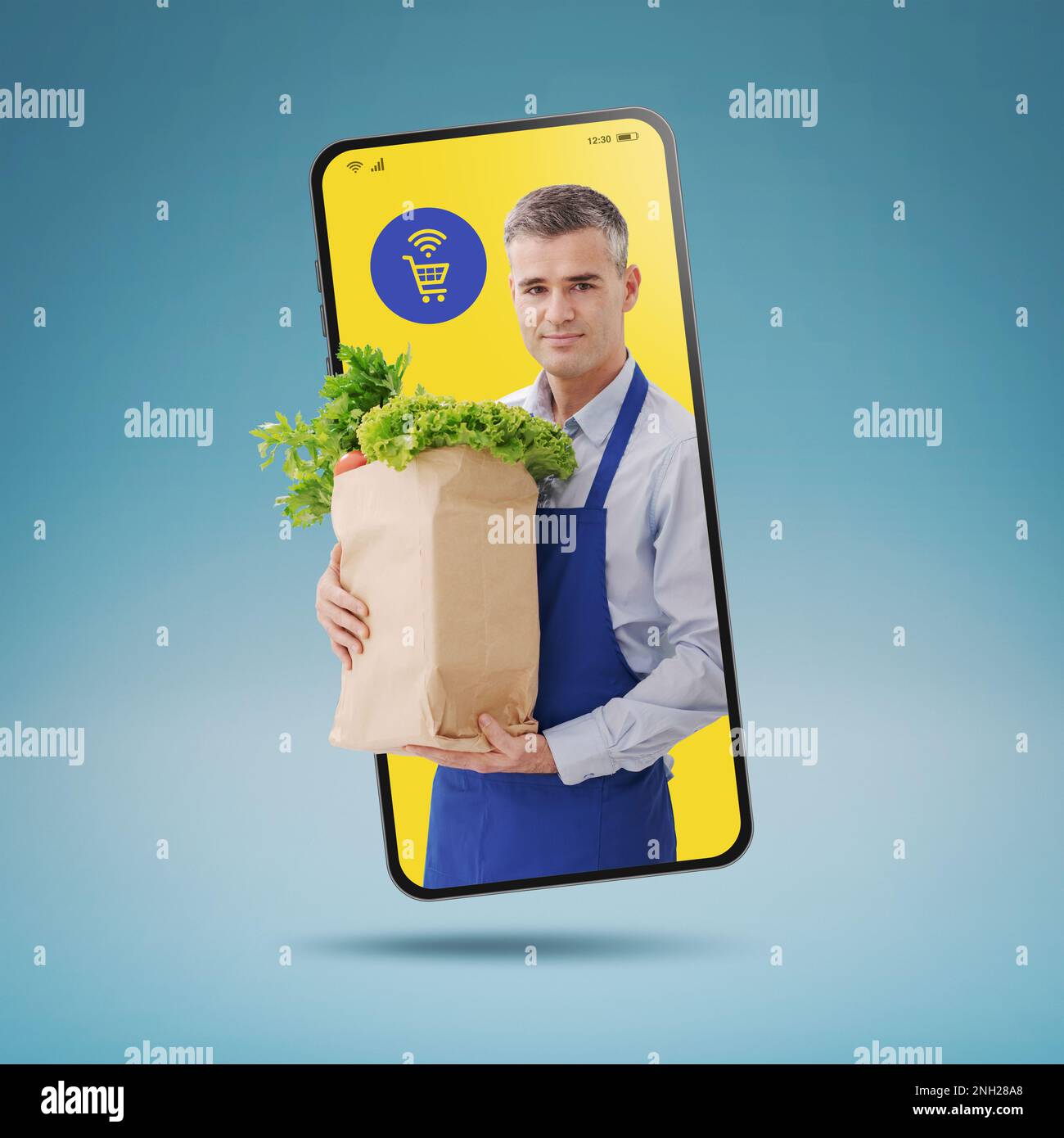 Online grocery shopping app: shop assistant holding a full grocery bag ...