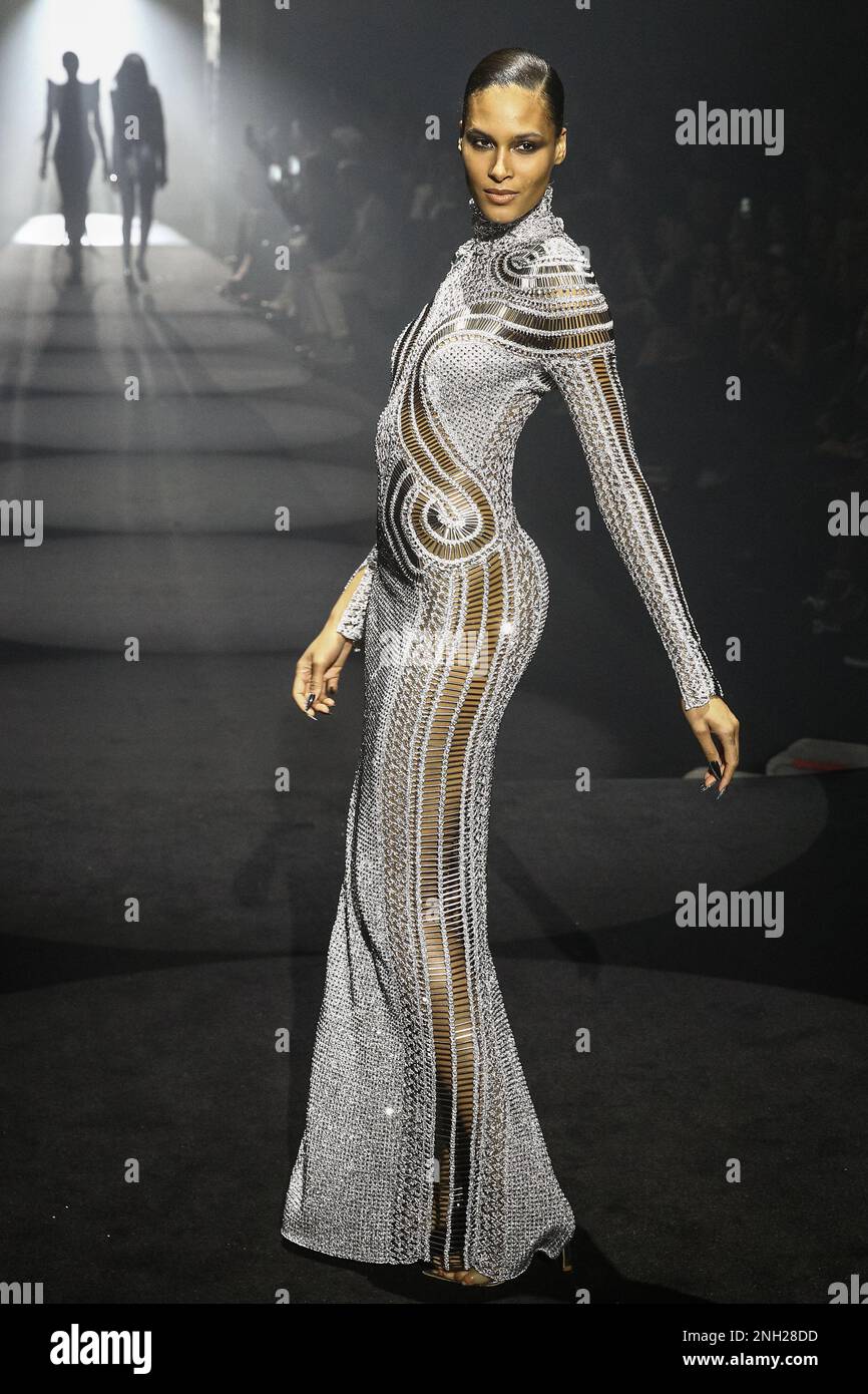 Cindy Bruna, model, walks in floor length metallic gown. Models on the ...