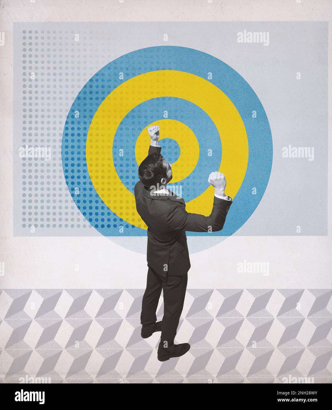 Successful businessman celebrating with arms raised and target ...
