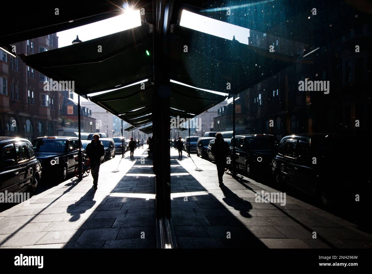 A street scene outside Harrods department store in Knighsbridge, London ...