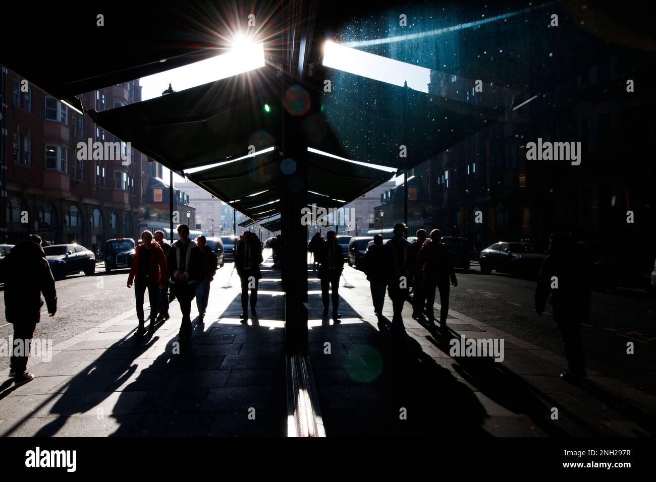 A street scene outside Harrods department store in Knighsbridge, London ...