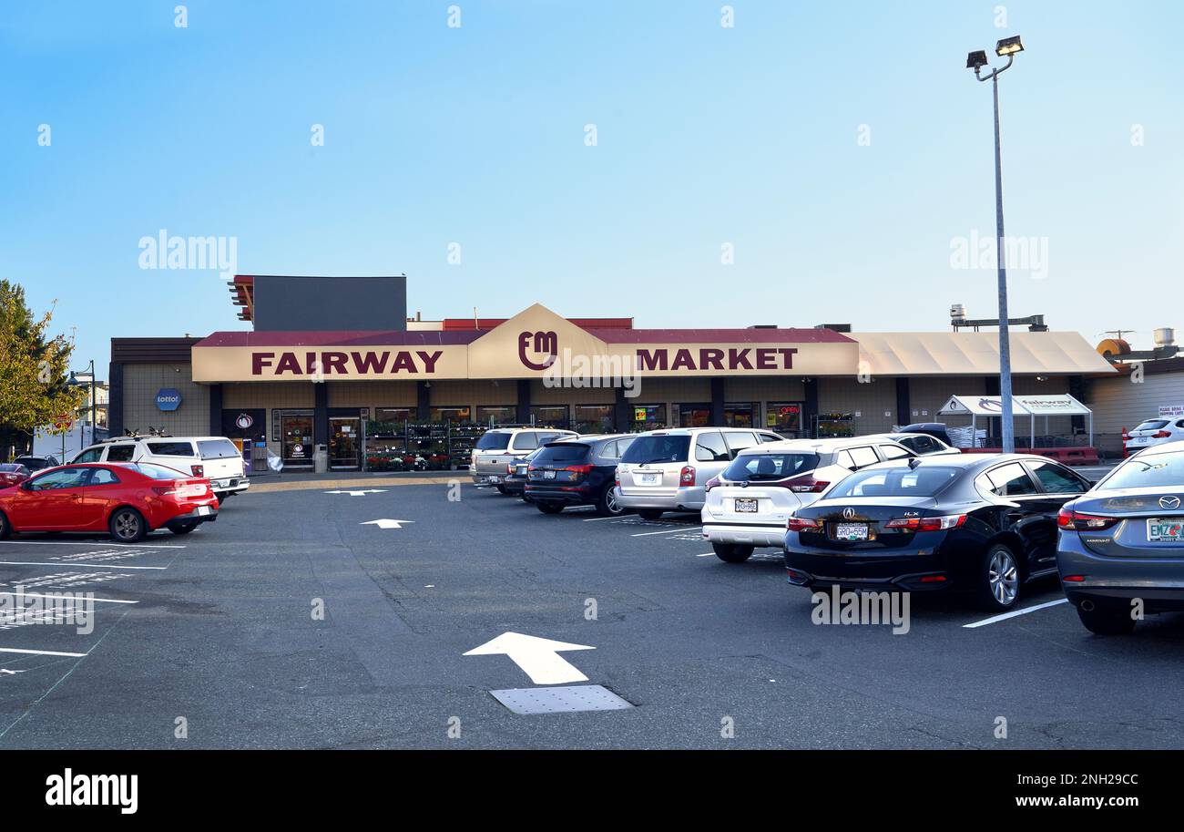 Fairway market grocery store and parking lot with numerous parked ...
