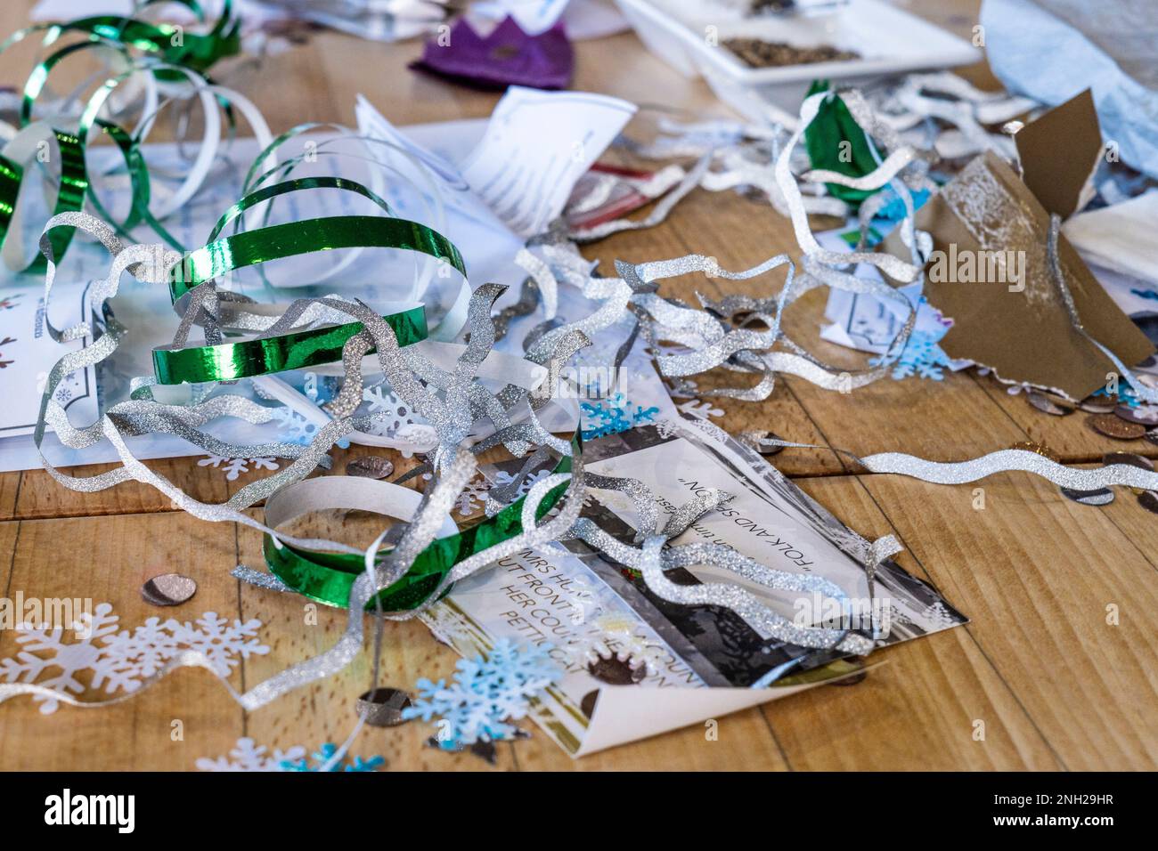 Christmas decorations left on an uncleared table inside a restaurant ...