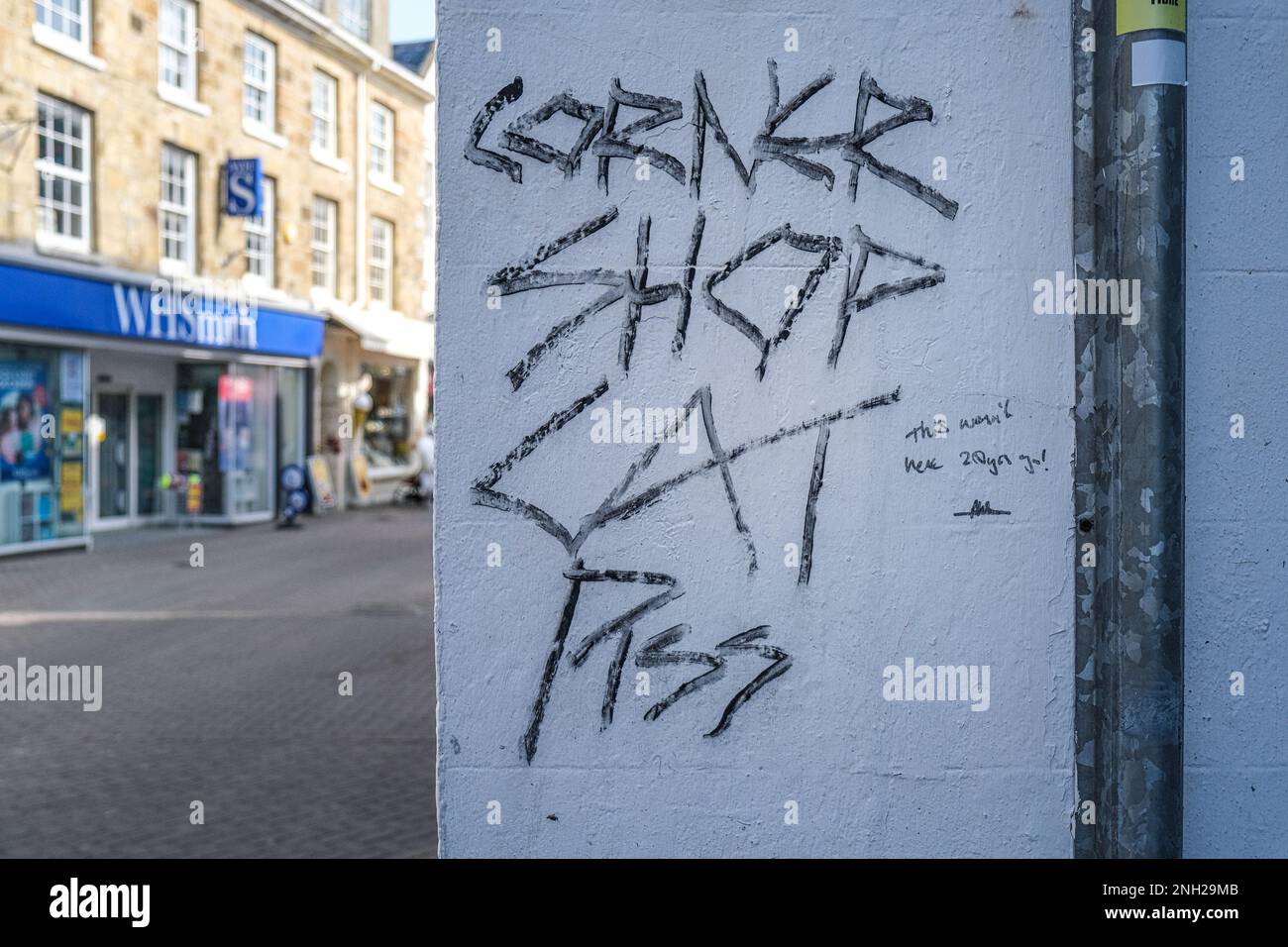 Unsightly graffiti scrawled on the wall of a building in Newquay Town ...