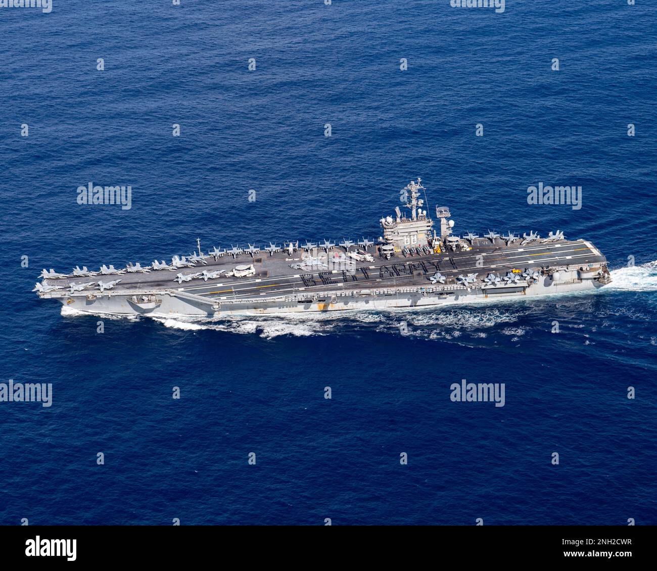 221208-N-ZQ263-1054 PACIFIC OCEAN (Dec. 8, 2022) U.S. Navy Sailors form the phrase "Beat Army ...
