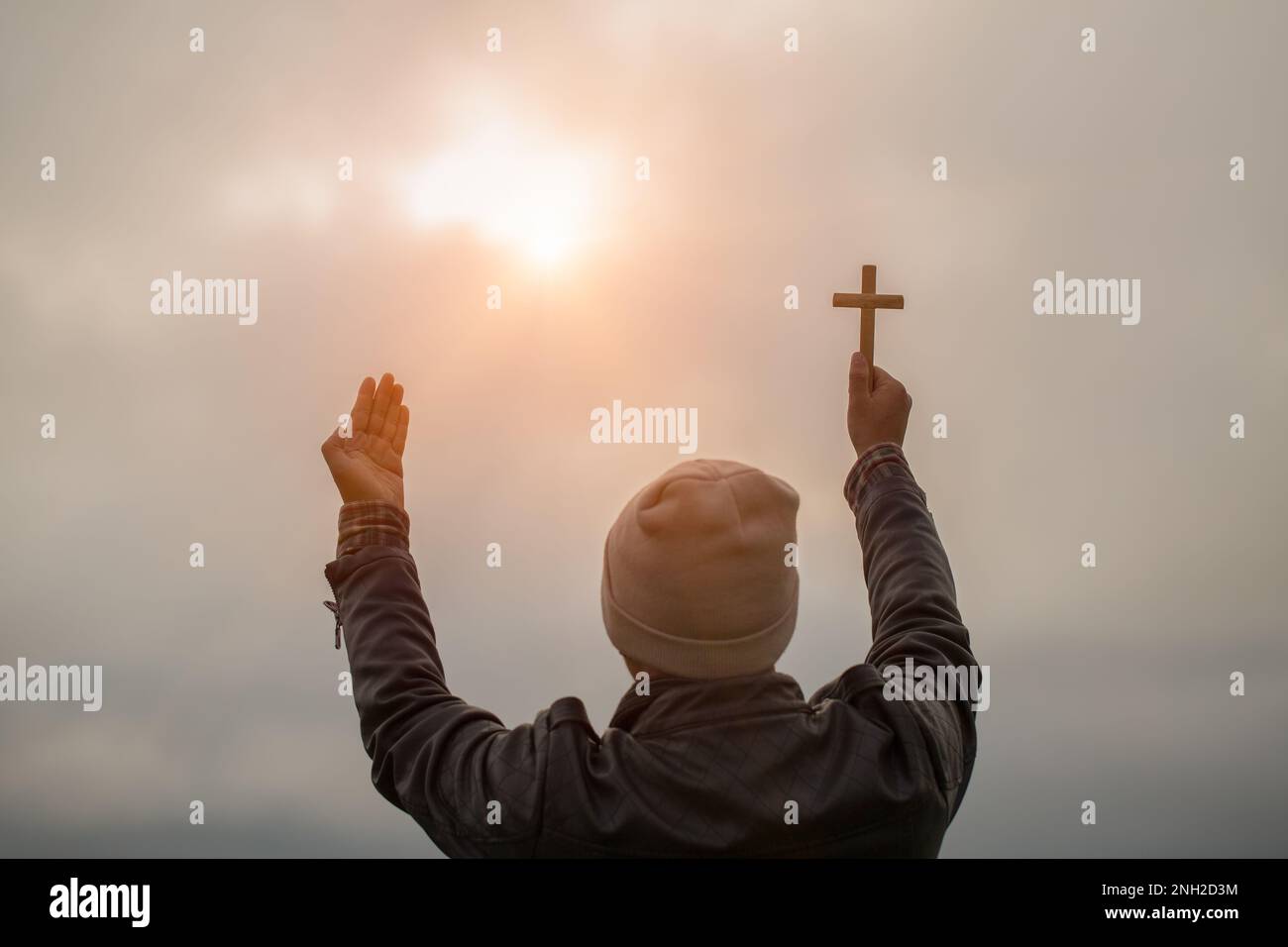 Human hand holds cross and open palm up worship. Eucharist Therapy ...