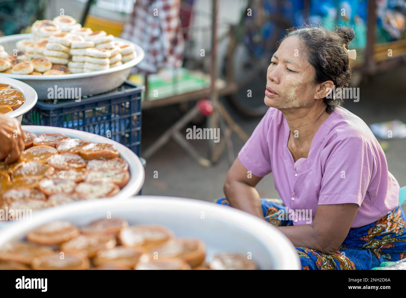 Urban scene from Maha Bandoola Road in Chinatown of Yangon. Myanmar is ...