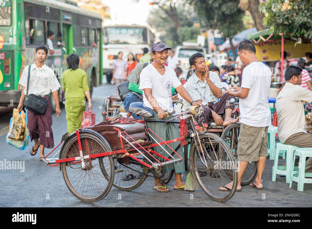 Urban scene from Maha Bandoola Road in Chinatown of Yangon. Myanmar is ...
