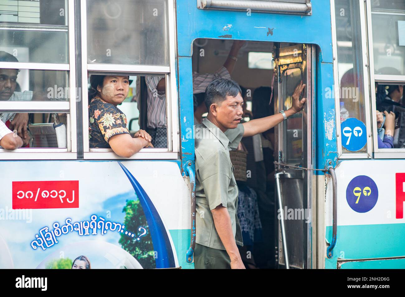 Urban scene from Maha Bandoola Road in Chinatown of Yangon. Myanmar is ...