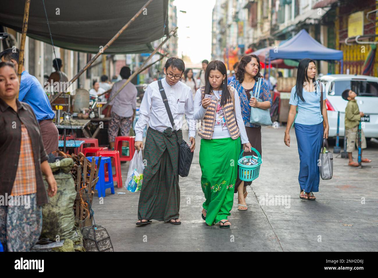 Urban scene from Maha Bandoola Road in Chinatown of Yangon. Myanmar is ...