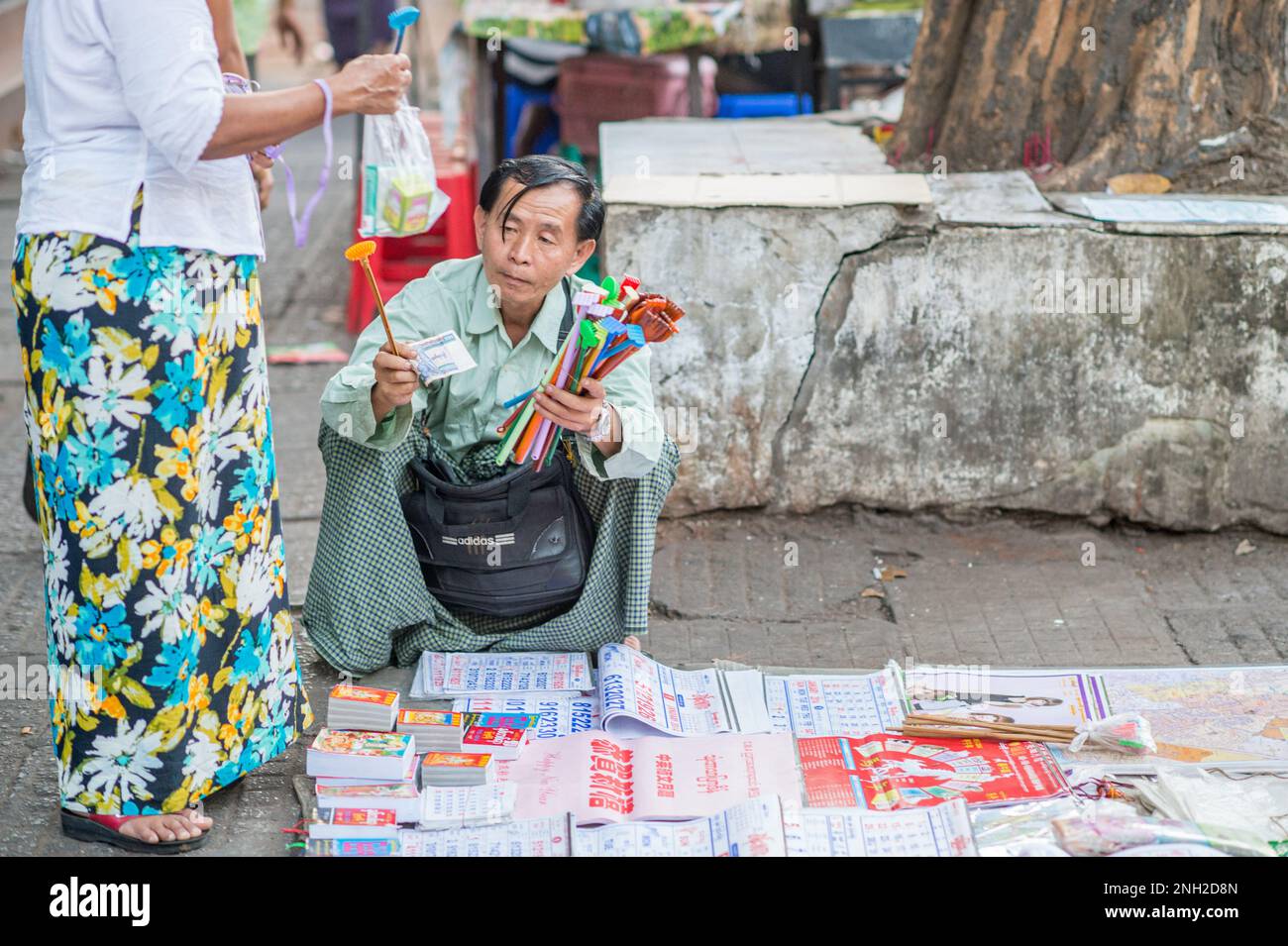 Urban scene from Maha Bandoola Road in Chinatown of Yangon. Myanmar is ...