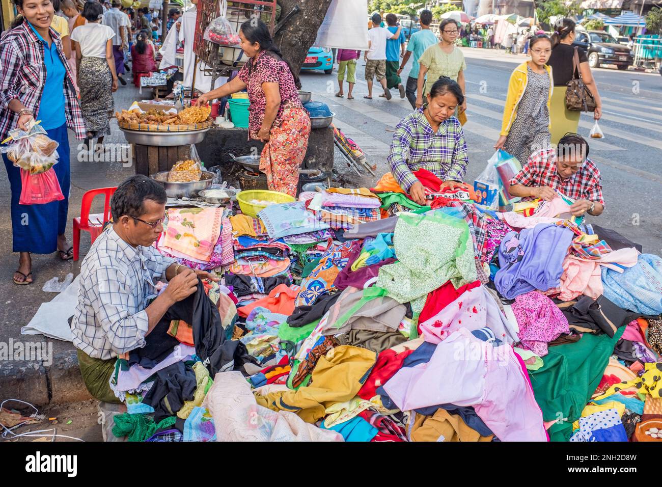 Urban scene from Maha Bandoola Road in Chinatown of Yangon. Myanmar is ...