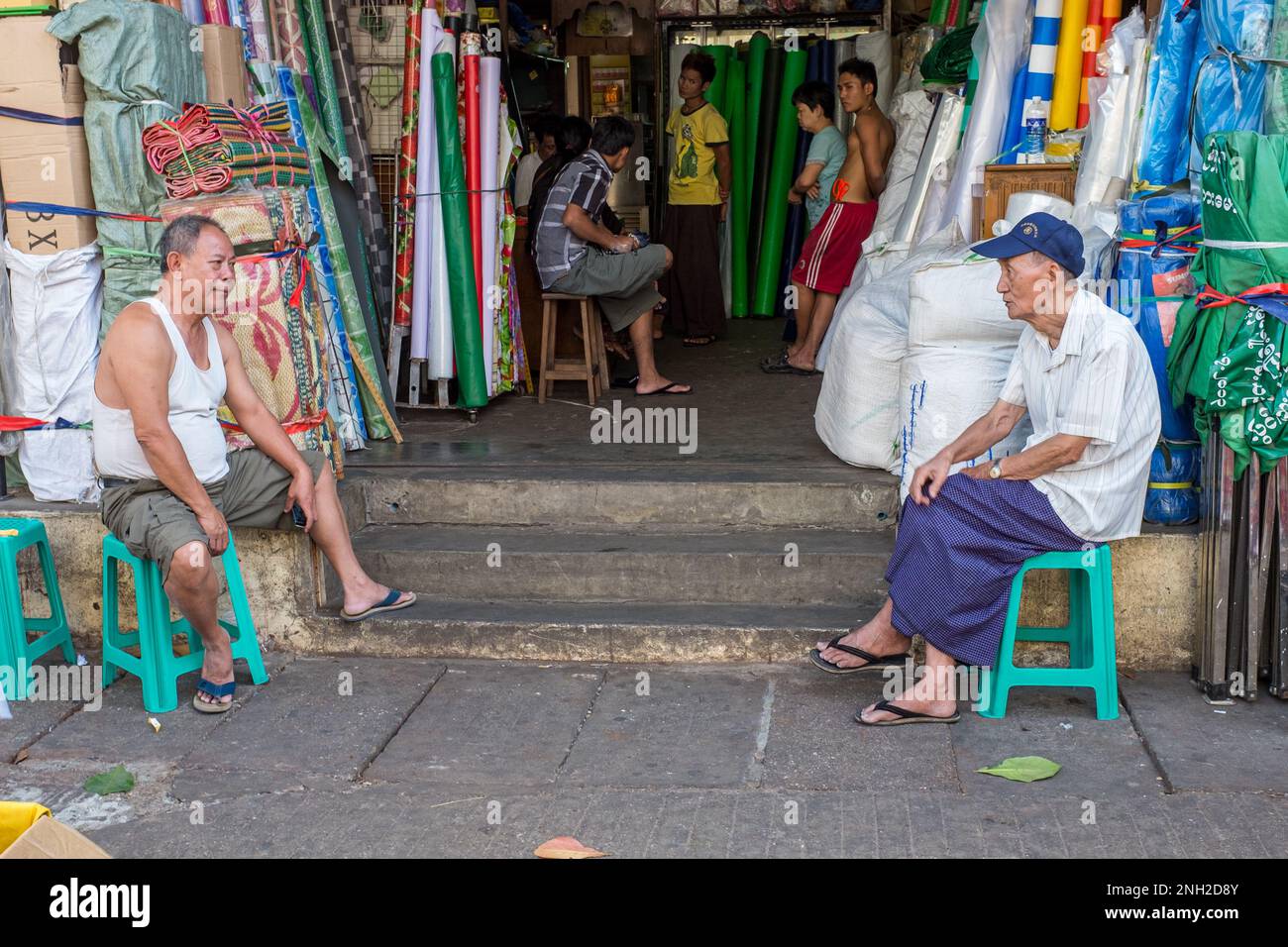 Urban scene from Maha Bandoola Road in Chinatown of Yangon. Myanmar is ...