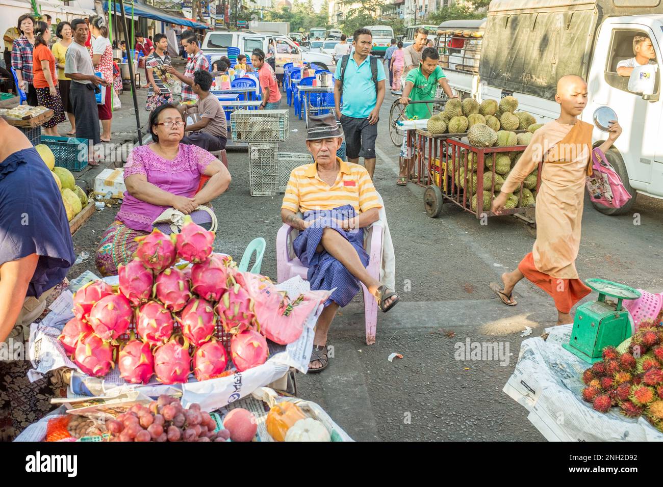 Urban scene from Maha Bandoola Road in Chinatown of Yangon. Myanmar is ...