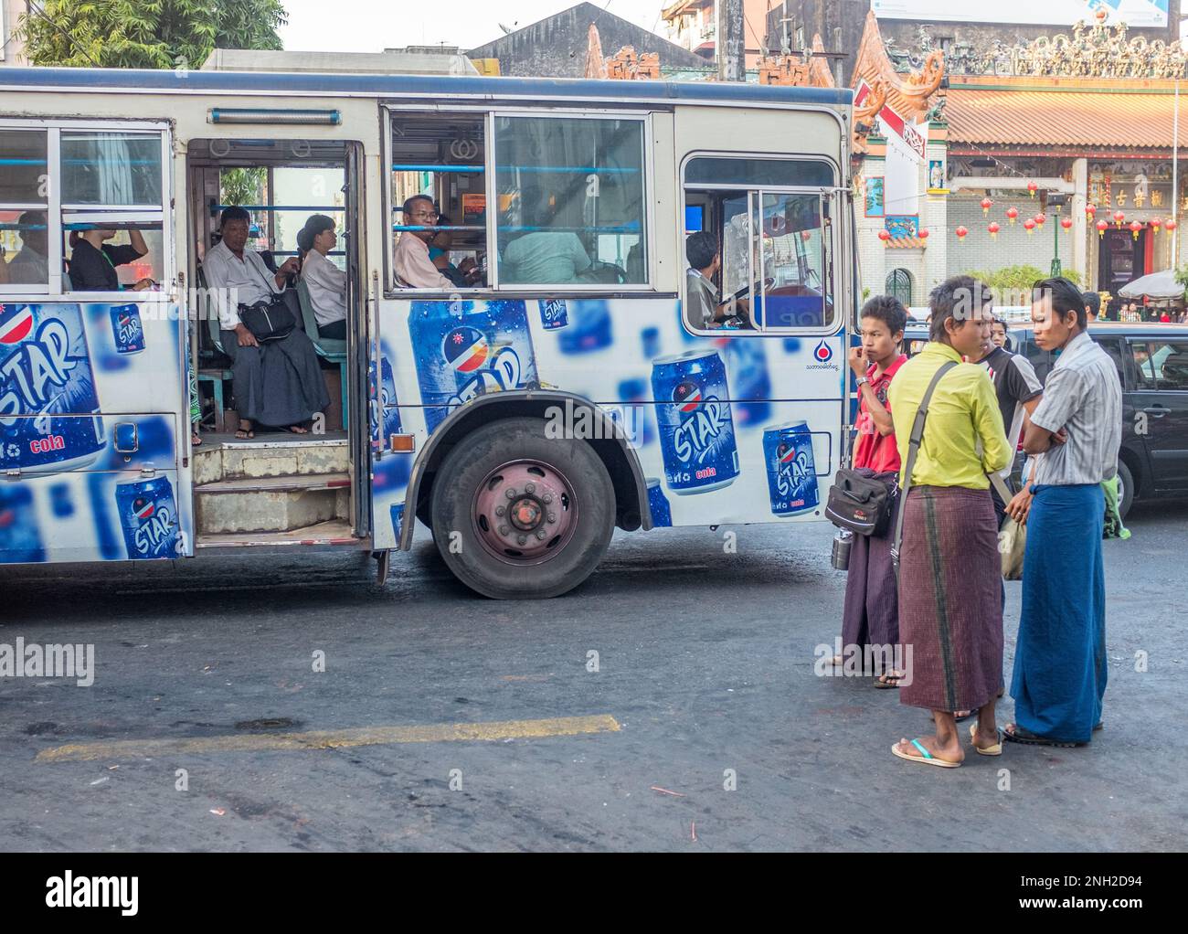 Urban scene from Maha Bandoola Road in Chinatown of Yangon. Myanmar is ...