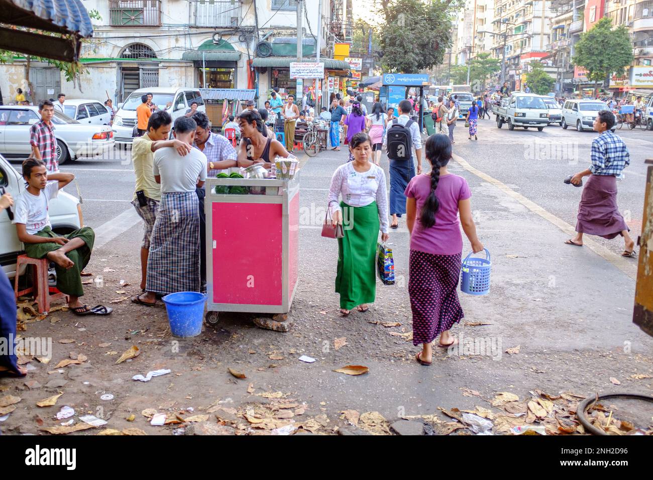 Urban scene from Maha Bandoola Road in Chinatown of Yangon. Myanmar is ...