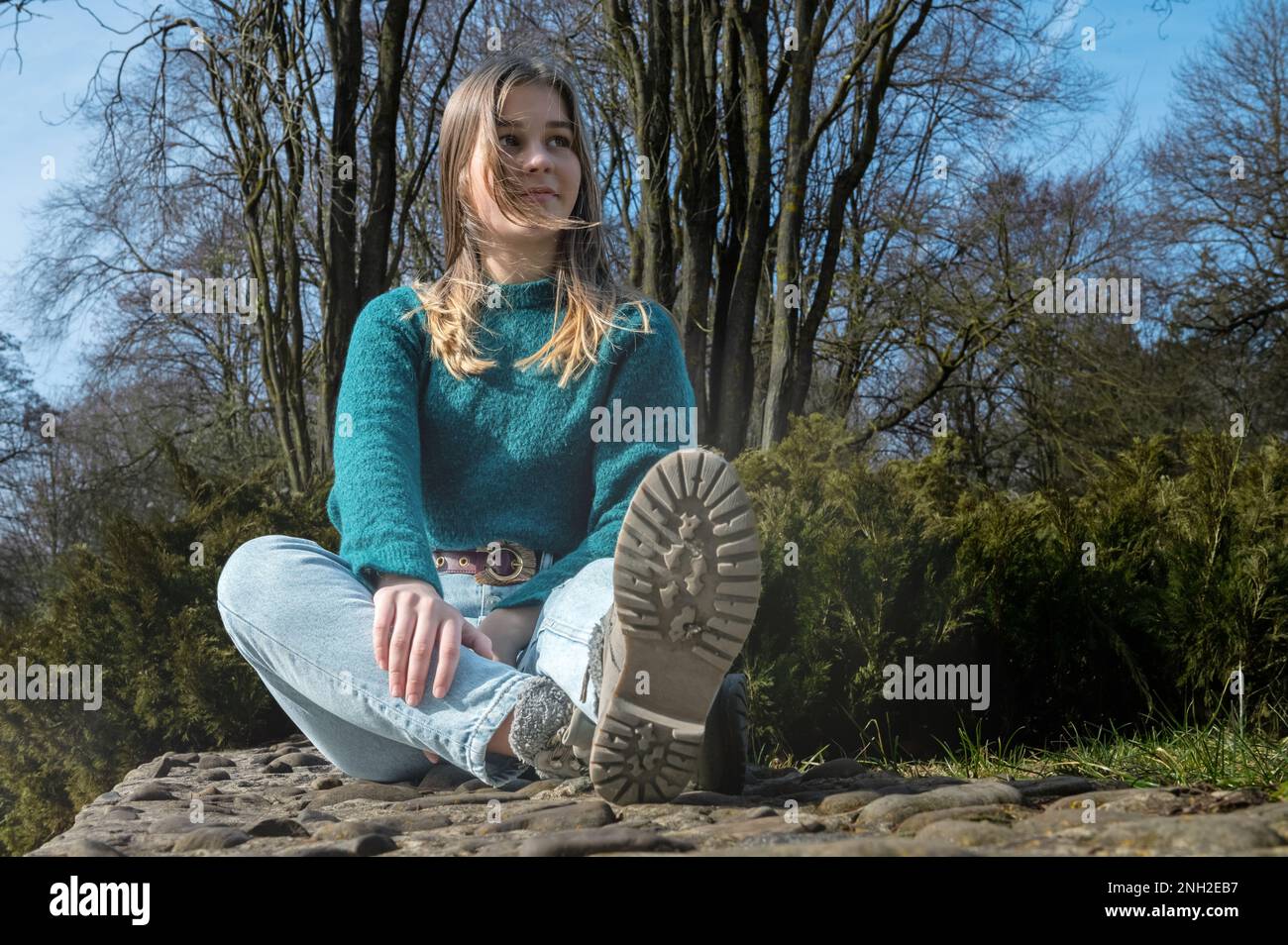 Teenage girl in spring park. Portrait of beautiful teenage caucasian ...