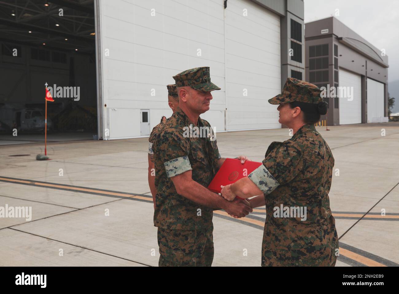 U.S. Marine Corps Col. Manlee Herrington, left, commanding officer ...