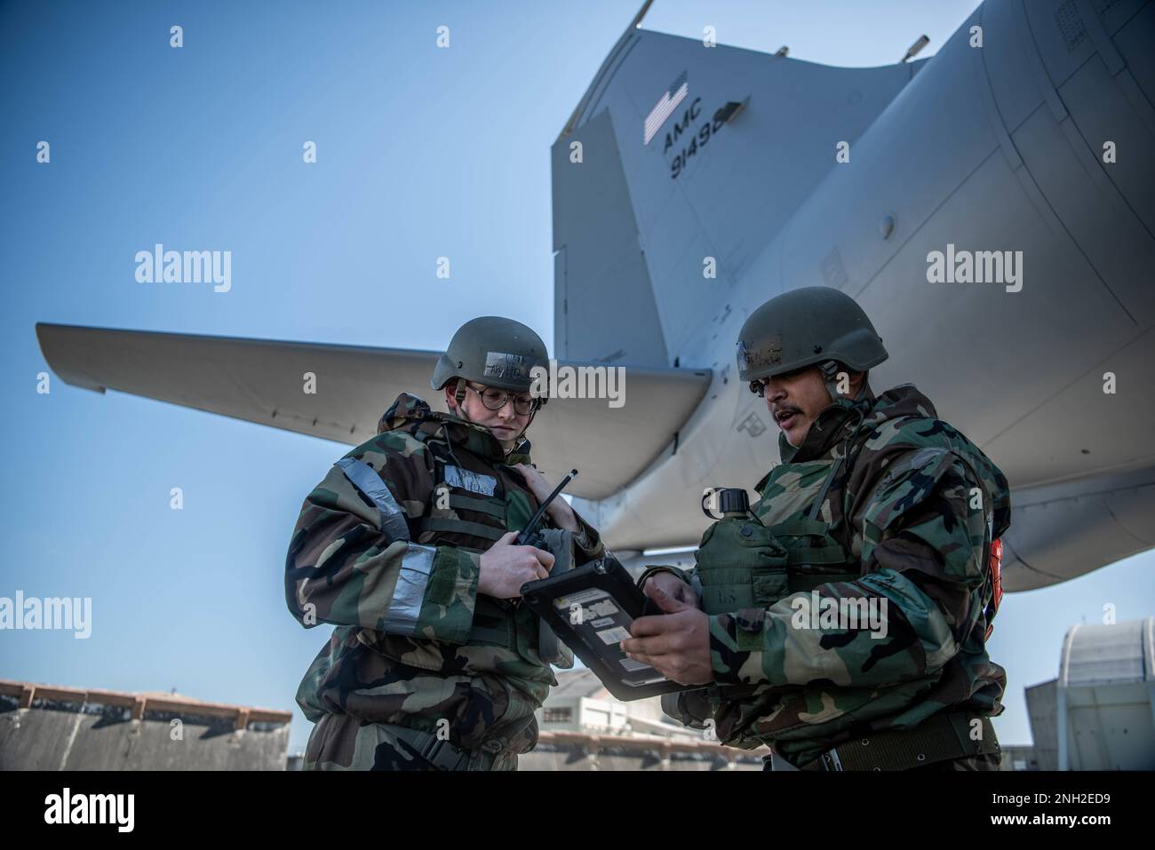 Airman 1st Class Logan Hensel, left, and Zachary Green, right, 909th ...