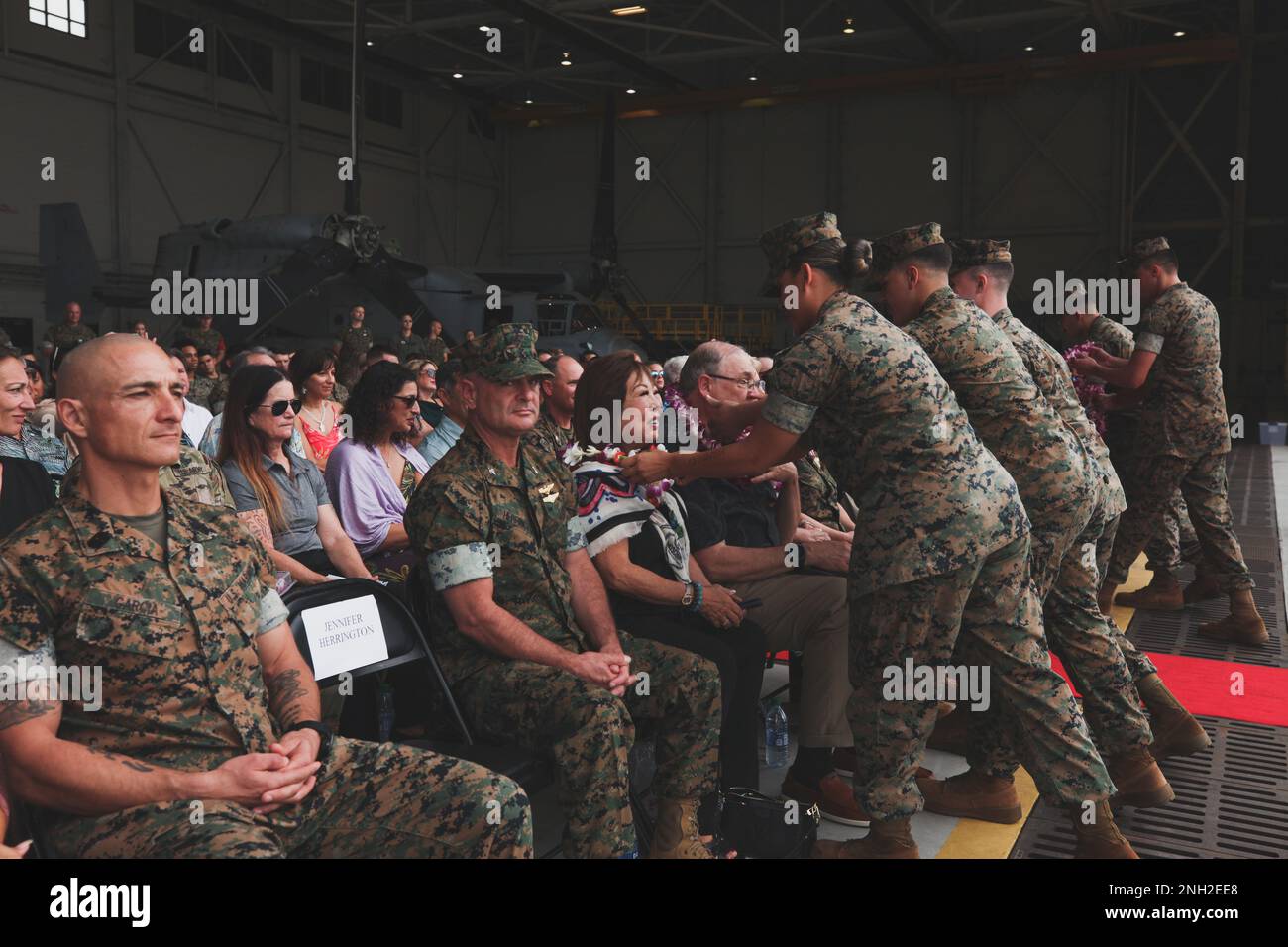 Hawaiian leis are presented to family members of U.S. Marine Corps Lt ...
