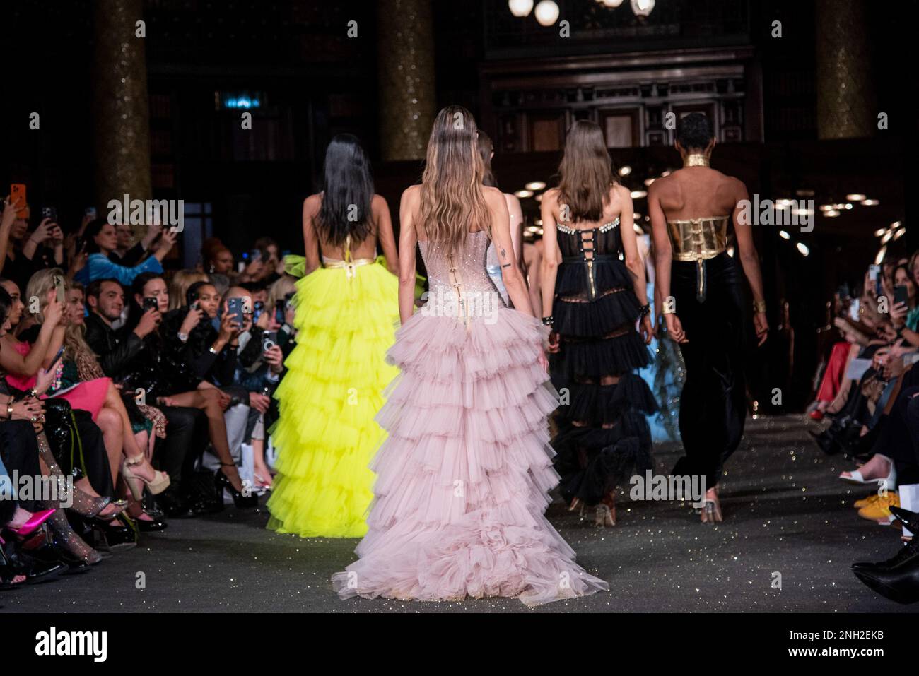 London, UK. 19th Feb, 2023. Models walk the runway during Aadnevik ...