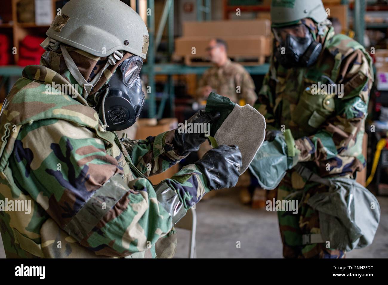 Senior Airman Aaron McFarland, left, 18th Civil Engineer Squadron water ...