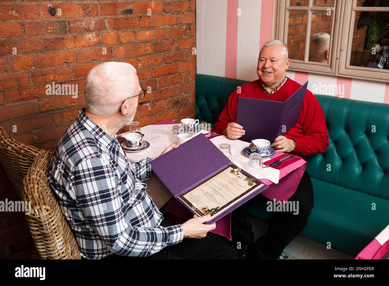 Two men at a cafe hi-res stock photography and images - Alamy