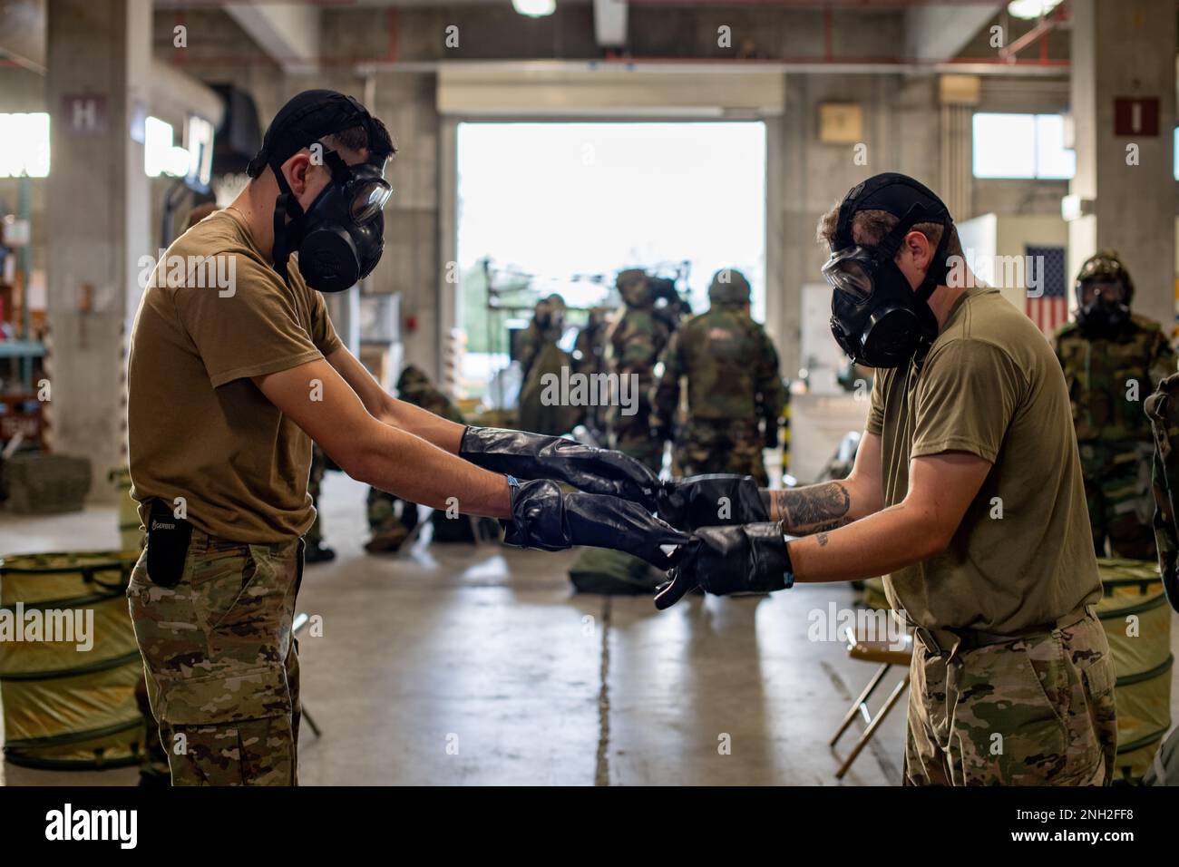 Senior Airman Aaron McFarland, right, 18th Civil Engineer Squadron ...