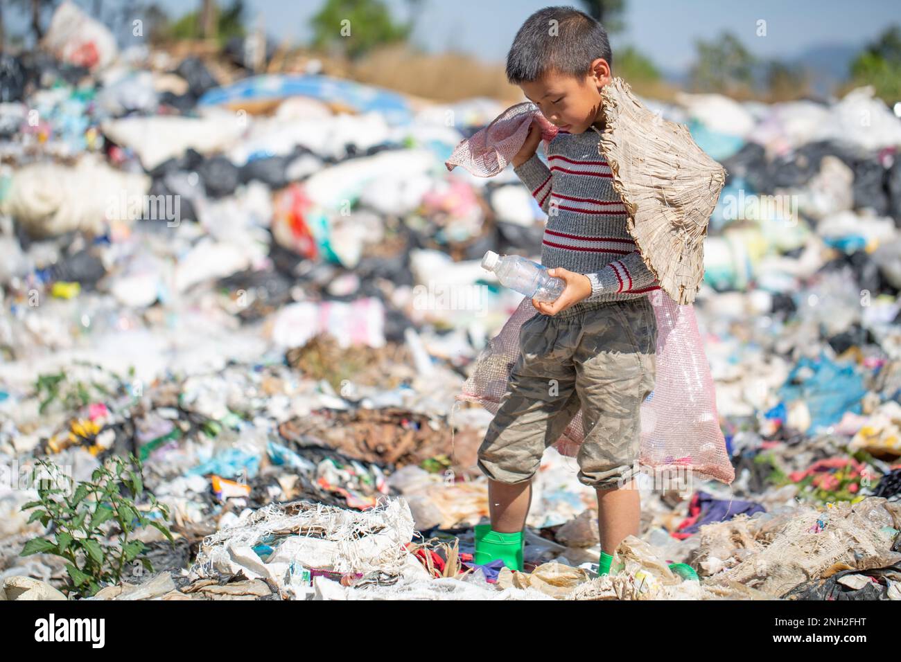 Poor children collect garbage for sale because of poverty, Junk recycle ...