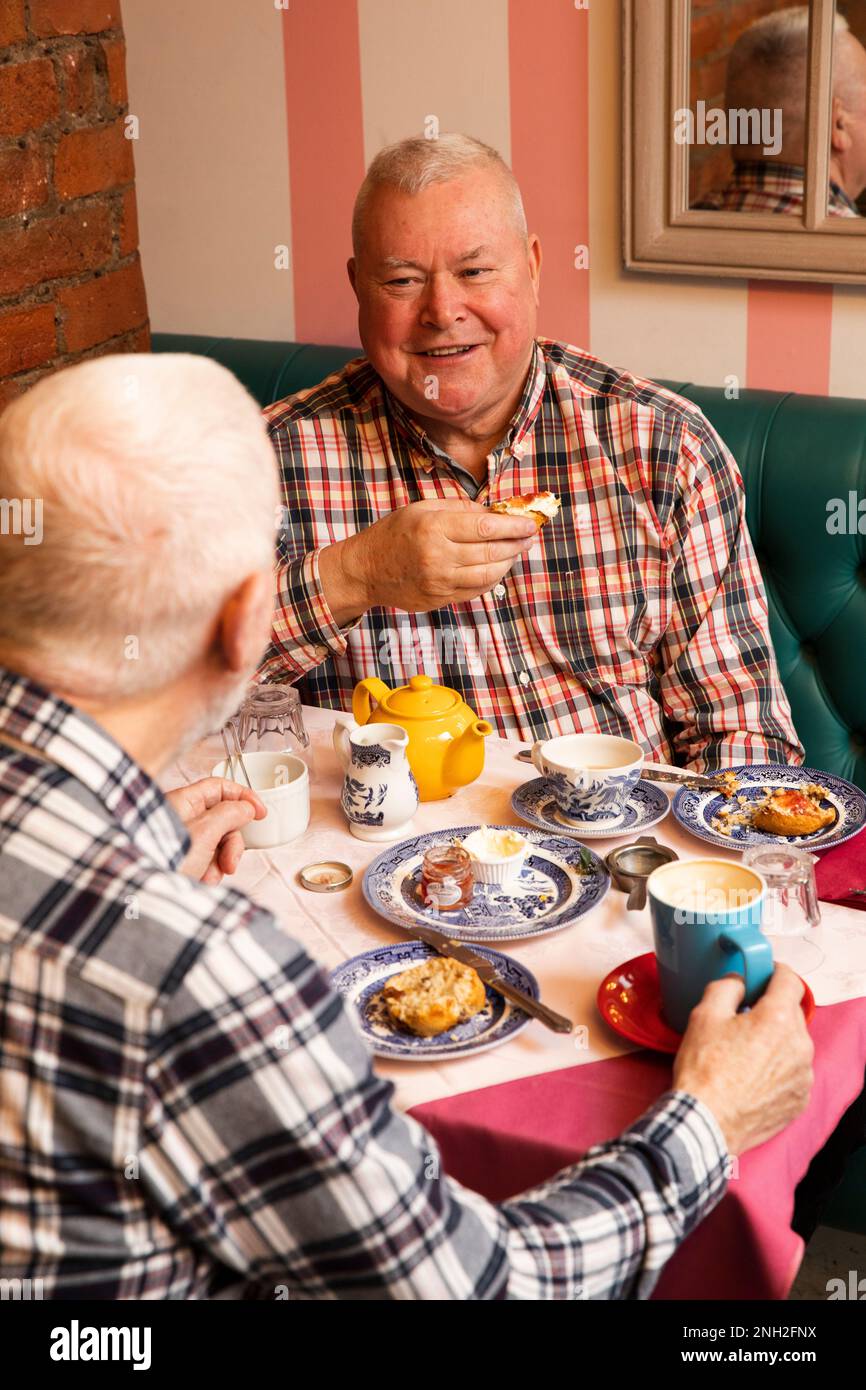 Two men in a cafe. Manchester. United Kingdom Stock Photo - Alamy