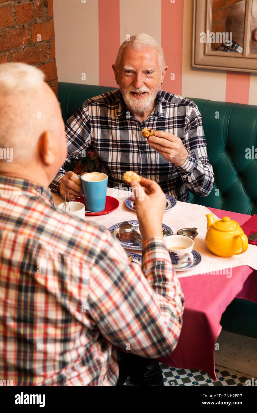 Two men in a cafe. Manchester. United Kingdom Stock Photo - Alamy