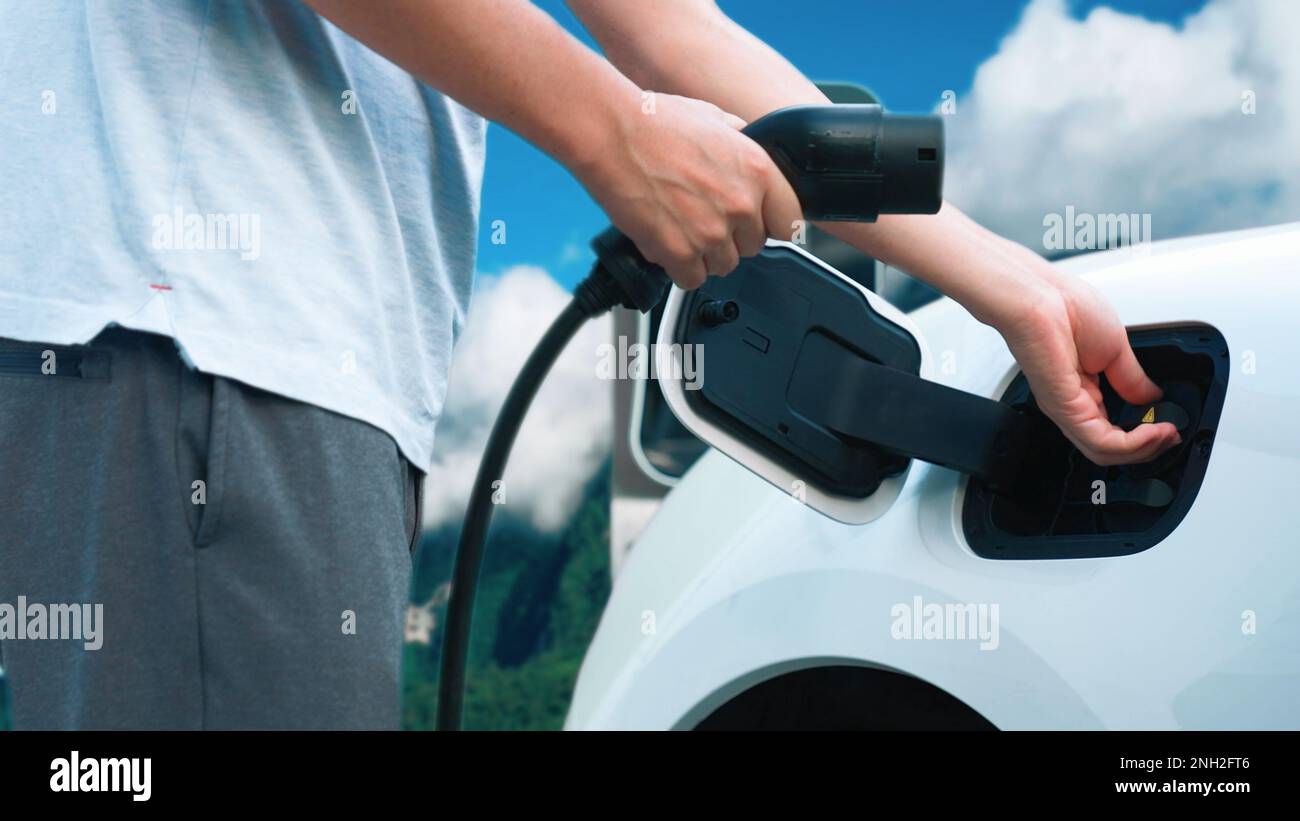 Installing electric vehicle charger hi-res stock photography and images ...