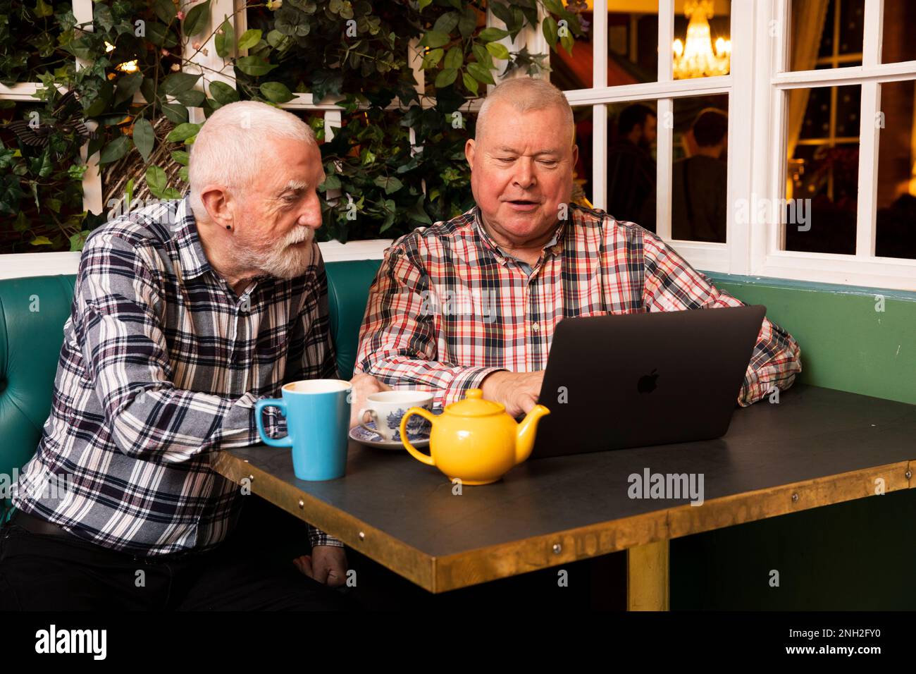 Two men in a cafe. Manchester. United Kingdom Stock Photo - Alamy