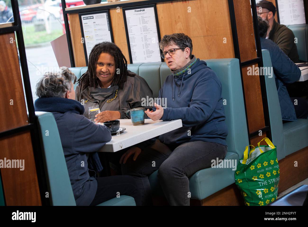 Group of women friends in a cafe, socialising. Manchester. United ...