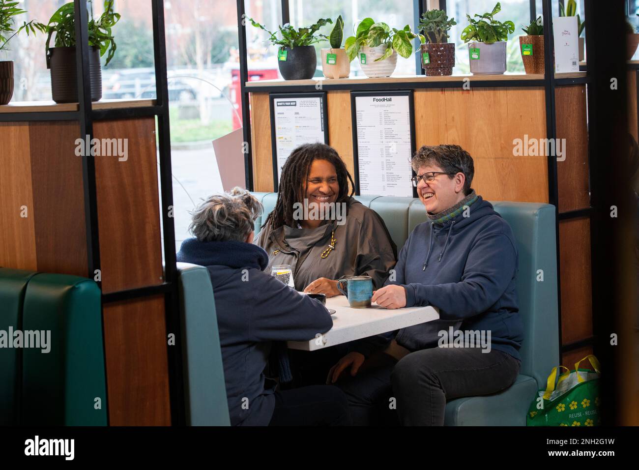 Group of women friends in a cafe, socialising. Manchester. United ...