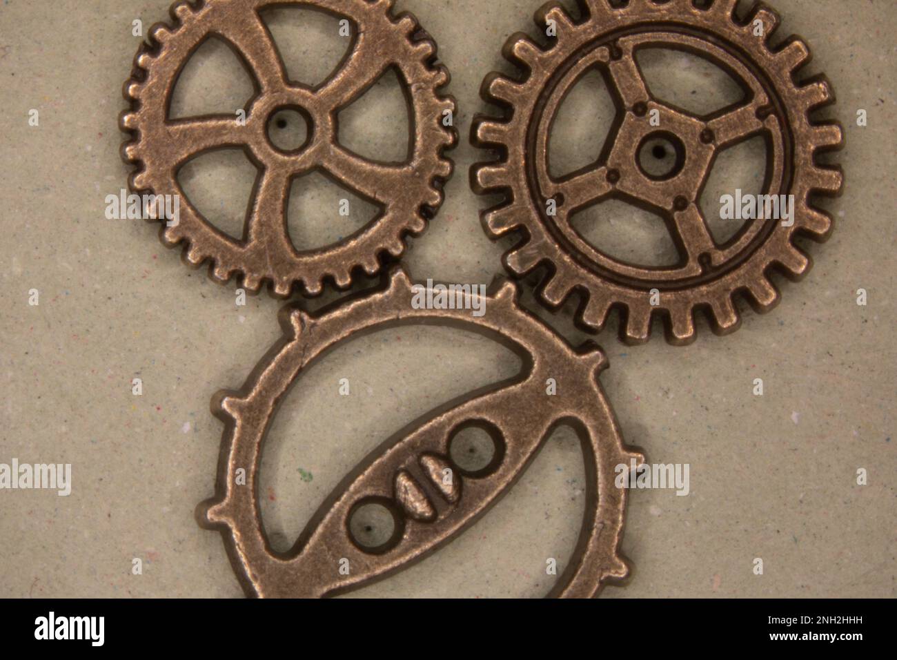 Brass gears are interlocked and form a gear or clockwork Stock Photo ...