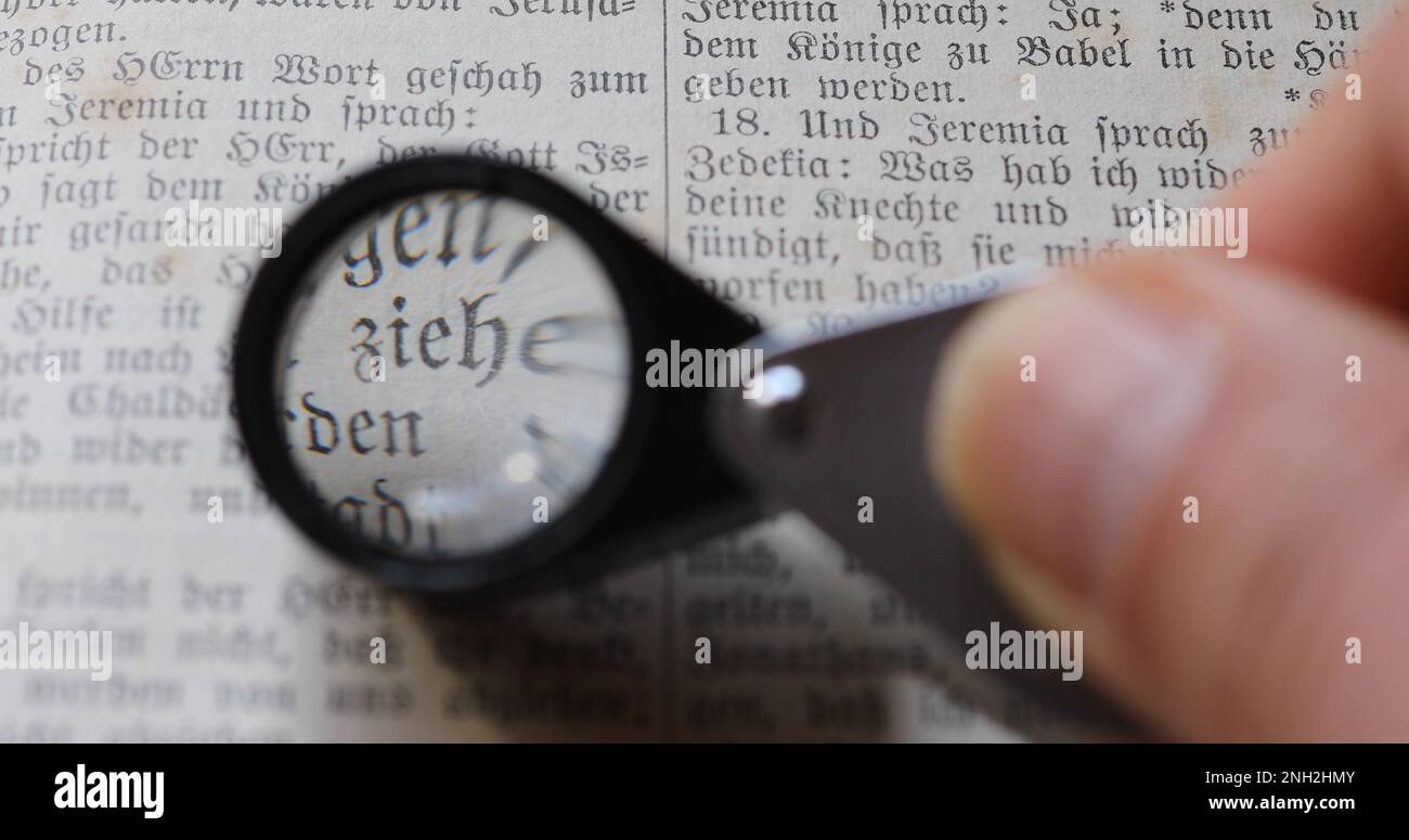 Magnifying glass over dictionary hi-res stock photography and images ...