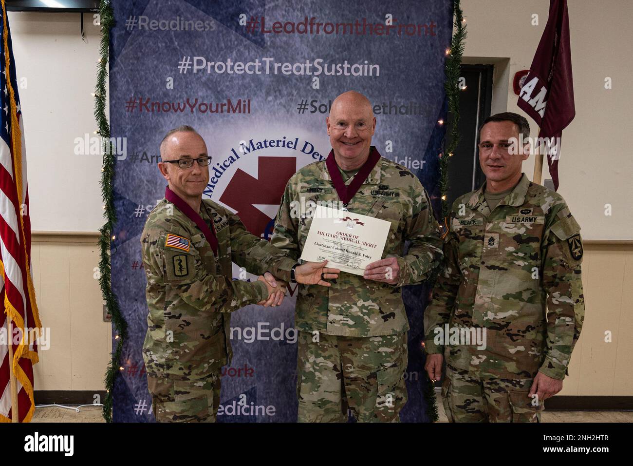 Col. Andy Nuce, left, presents the Order of Military Medical Merit to ...