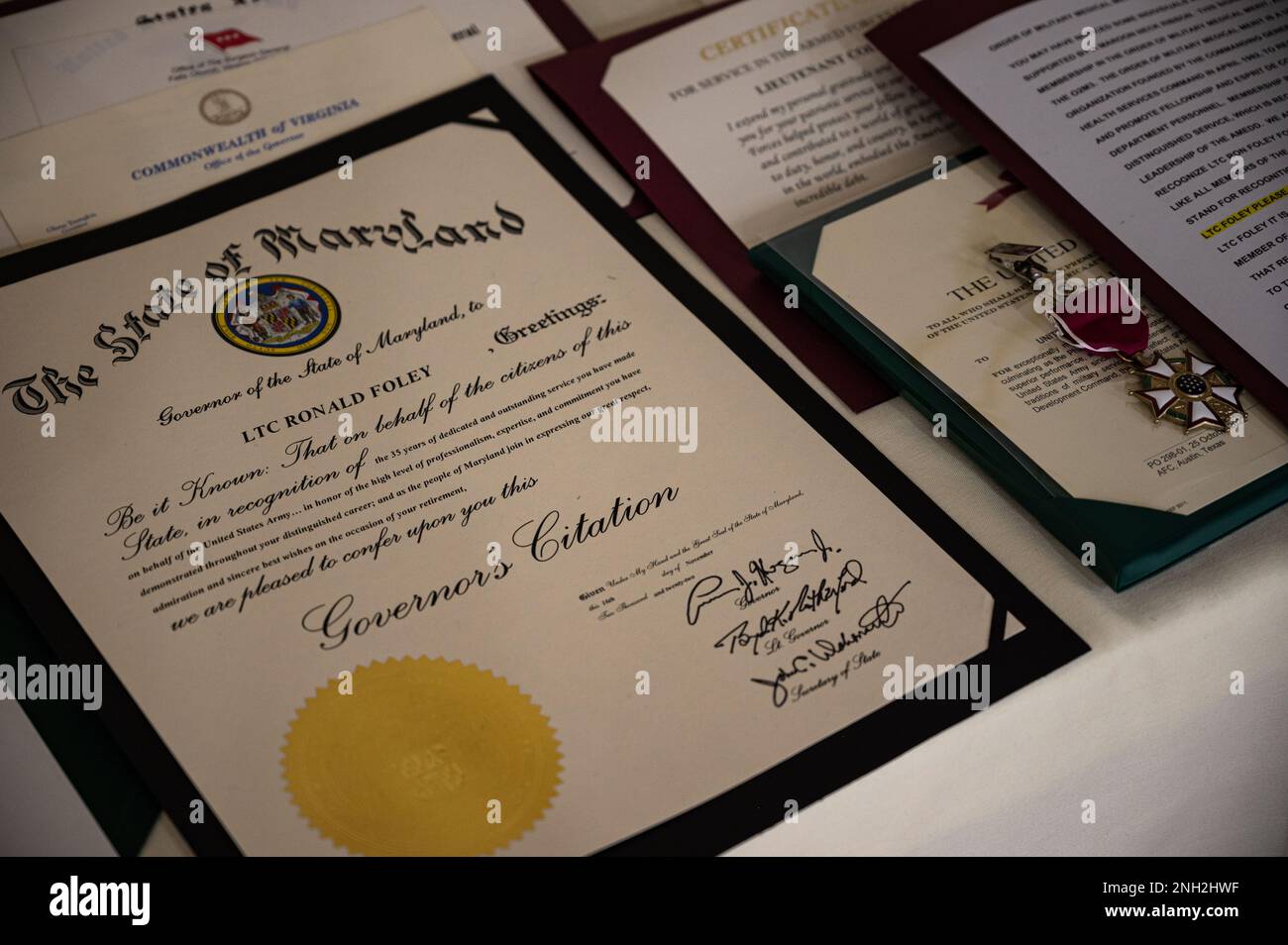 A series of command awards sit ready during a U.S. Army Medical ...
