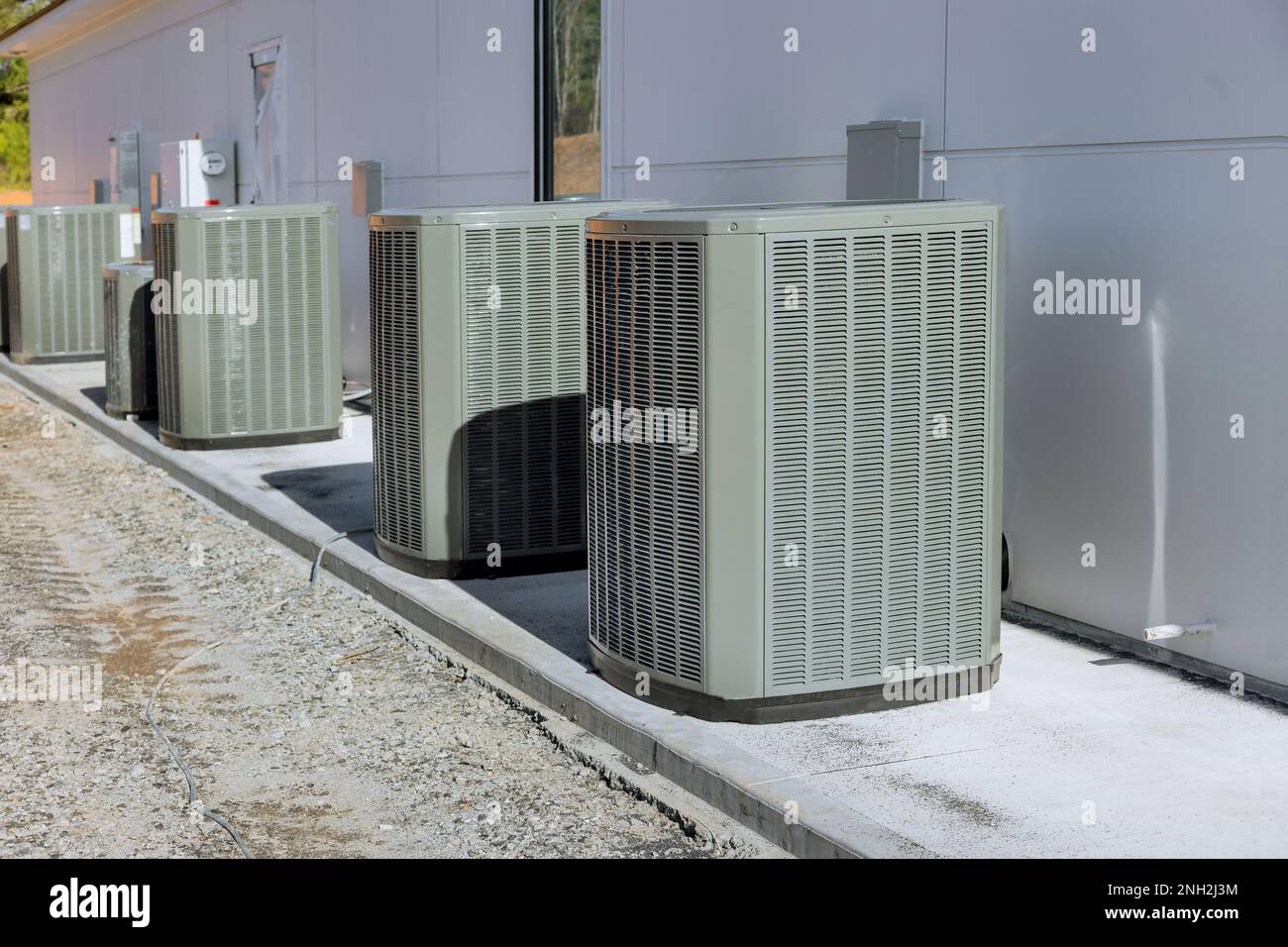 Outside air conditioning system unit has been installed on concrete ...